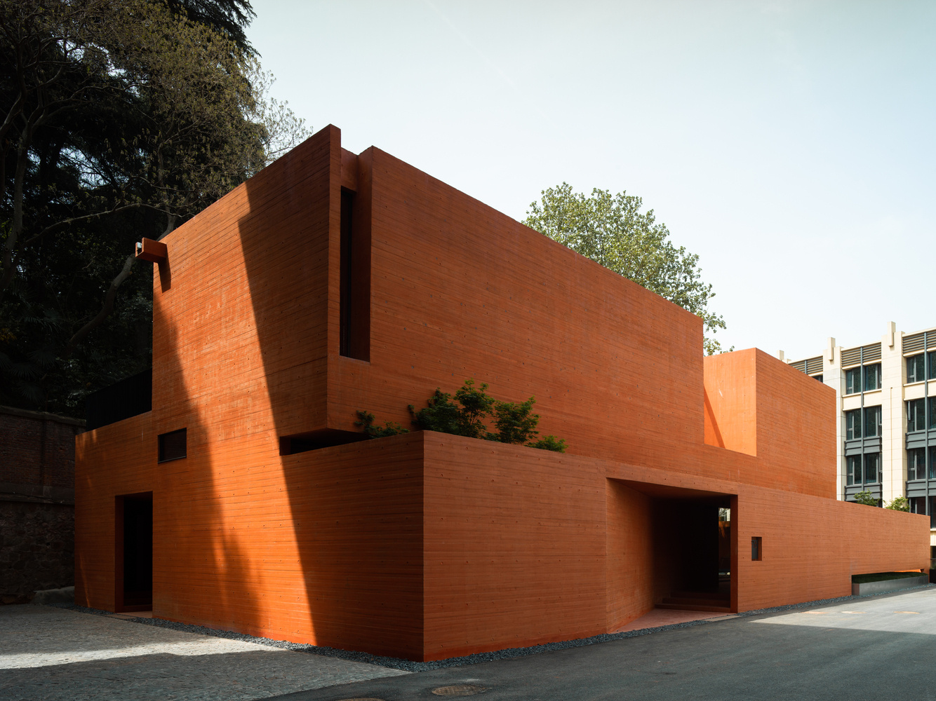 Mix Architecture’s Red Box Exhibition Center, a Majestic Monolith Carved From Complete Stone